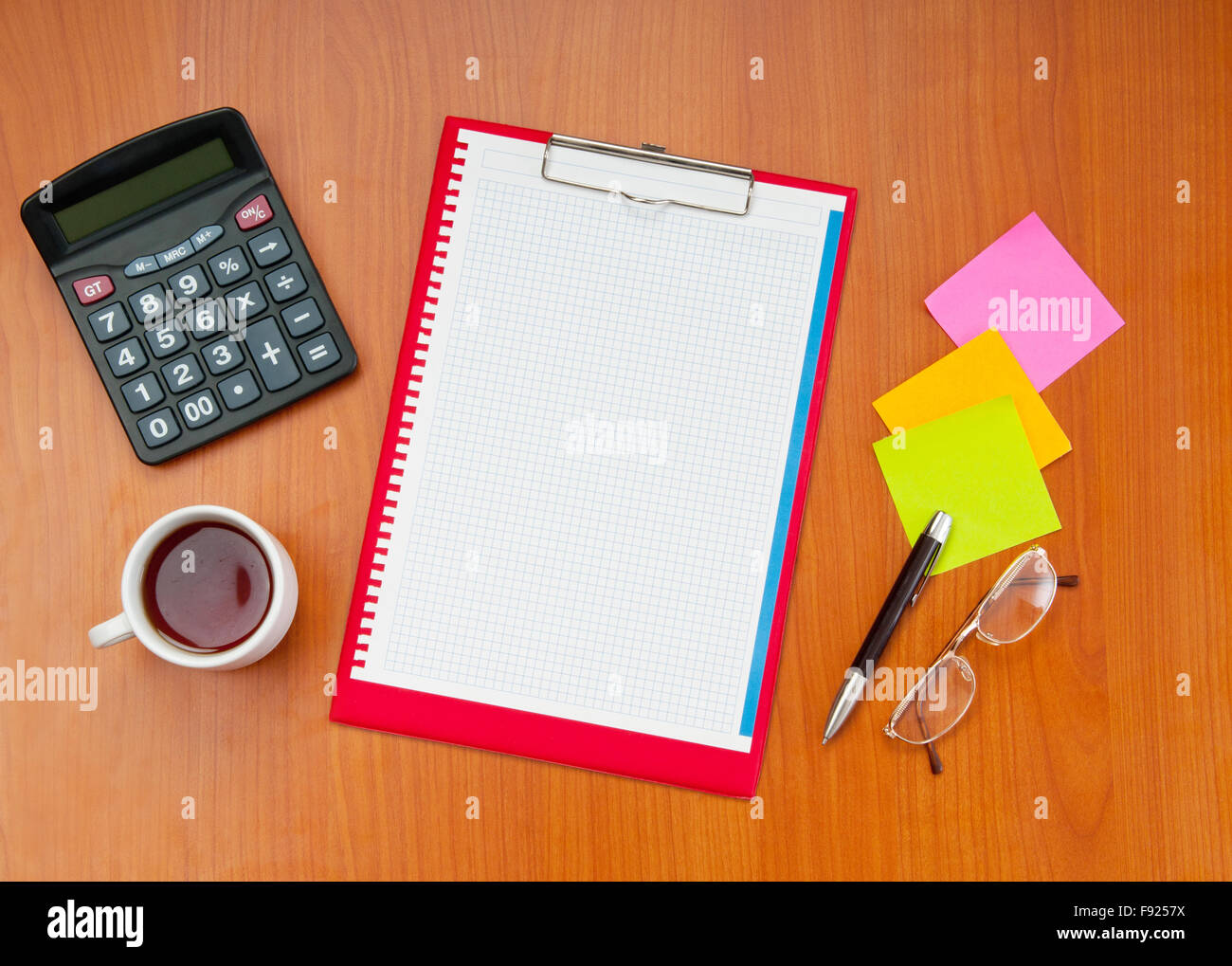Desk top with many items Stock Photo - Alamy