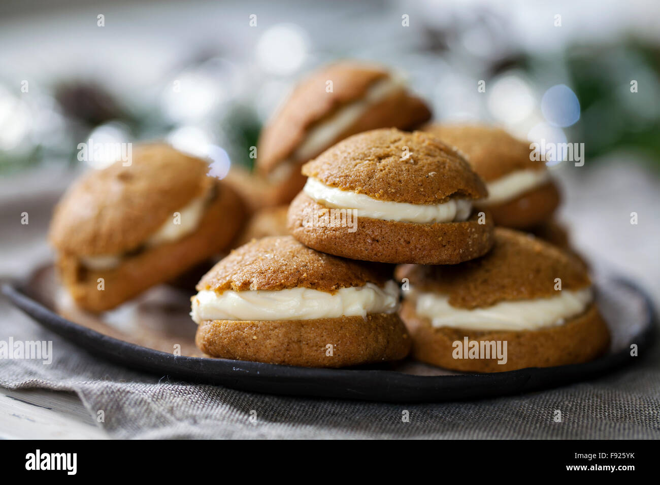 Ginger cookies filled with mascarpone and lemon curd cream Stock Photo ...