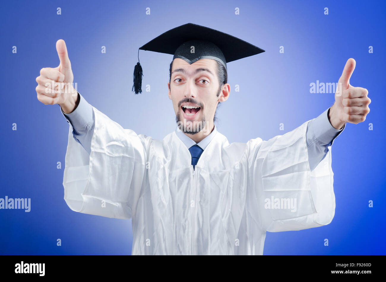 Young male student graduate Stock Photo - Alamy