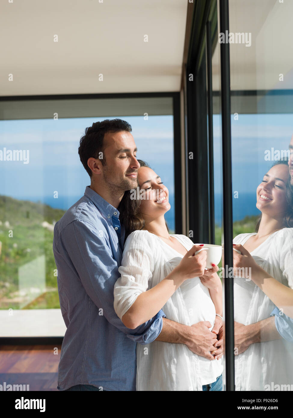 romantic happy young couple relax at modern home indoors Stock Photo ...