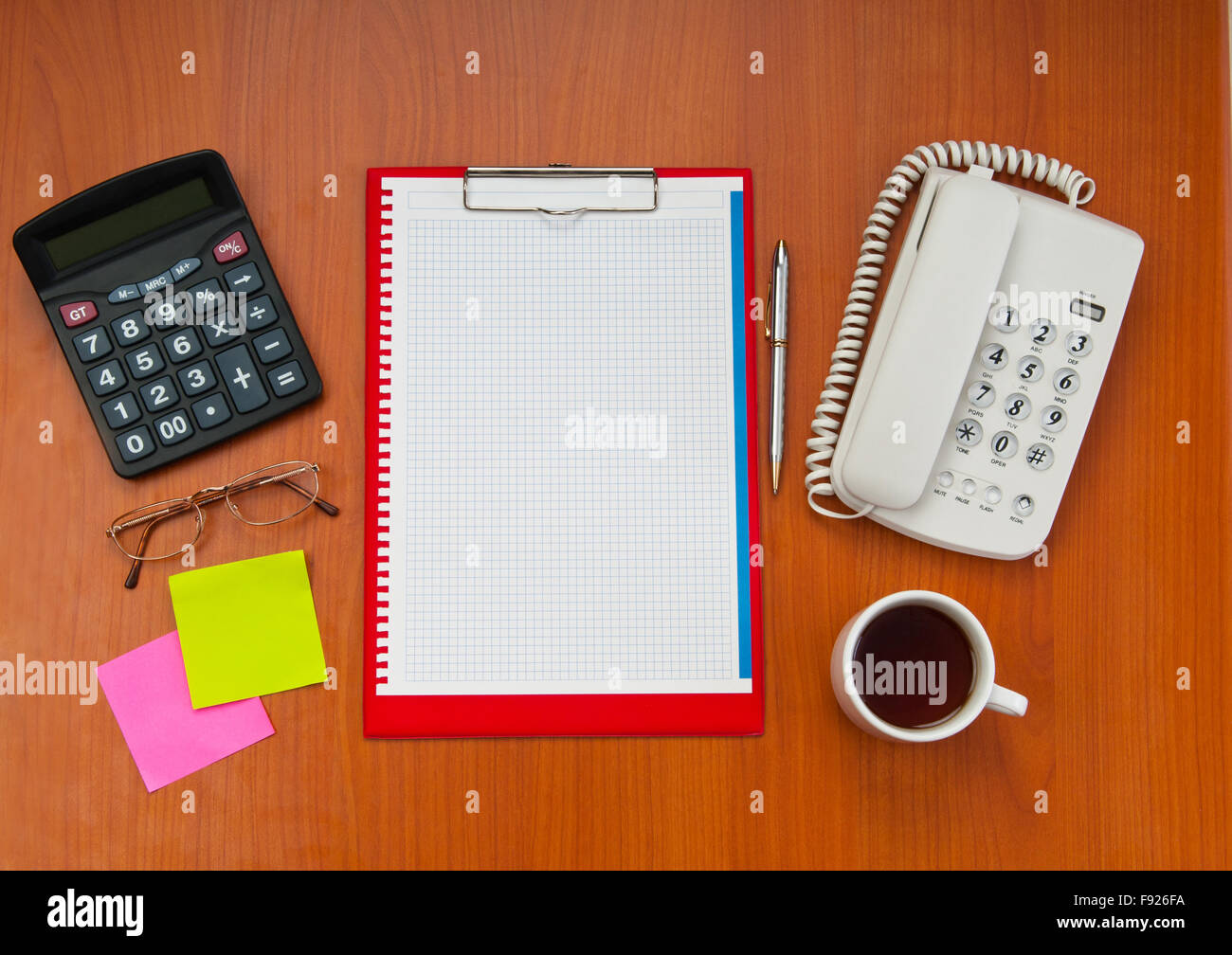 Desk top with many items Stock Photo - Alamy