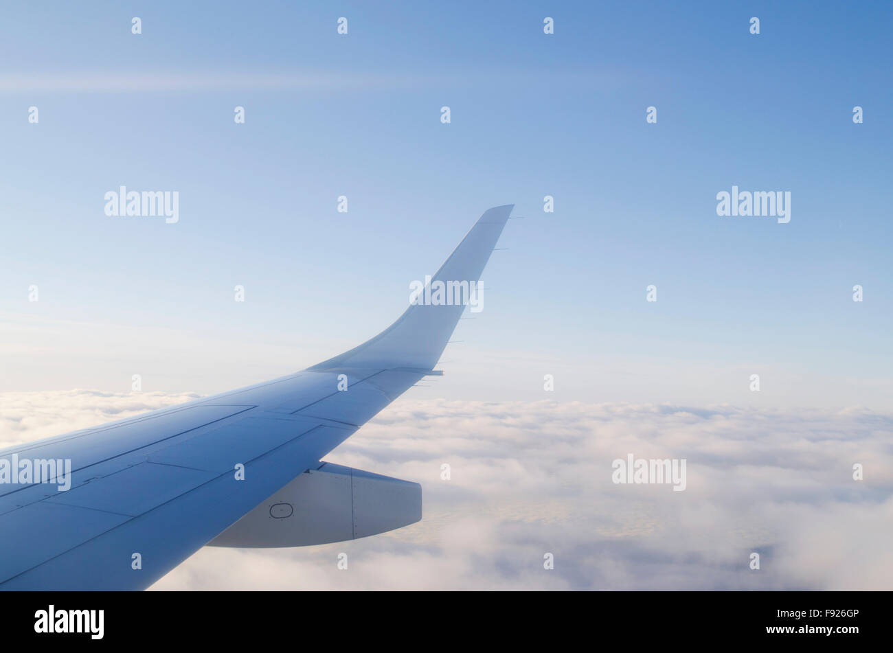 Wing of airplane from window Stock Photo - Alamy