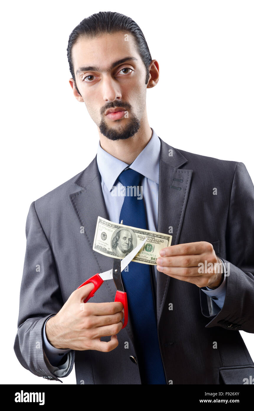Man cutting money on white Stock Photo - Alamy