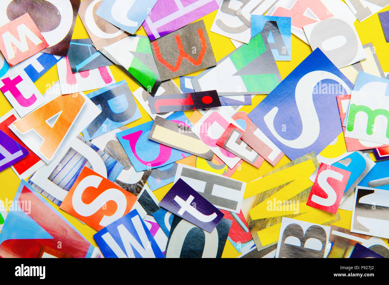 Newspaper clippings with various letters Stock Photo - Alamy
