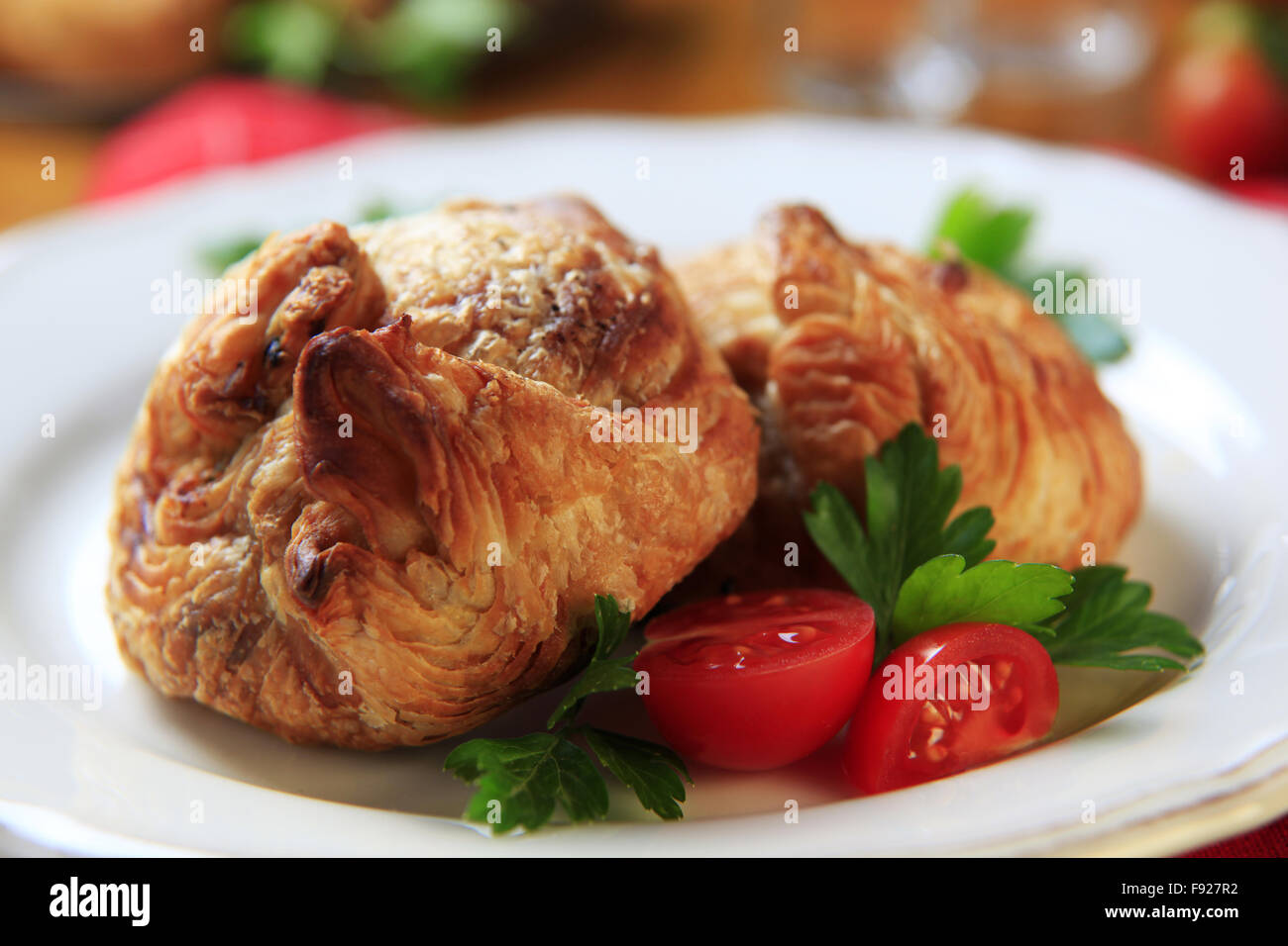 Puff pastry parcels stuffed with savory filling Stock Photo - Alamy