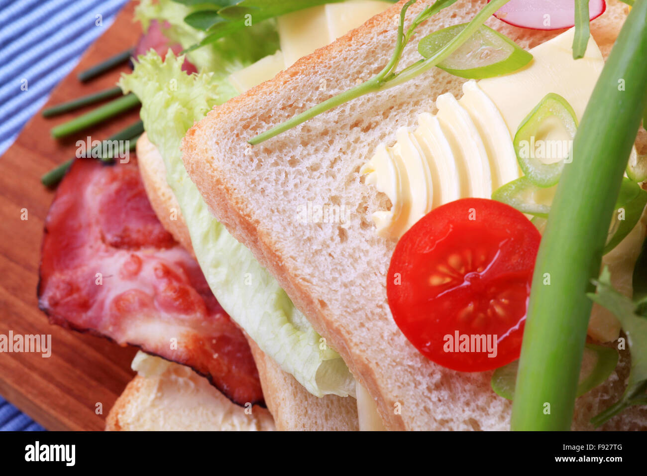 Detail of bacon and cheese sandwich - overhead Stock Photo - Alamy