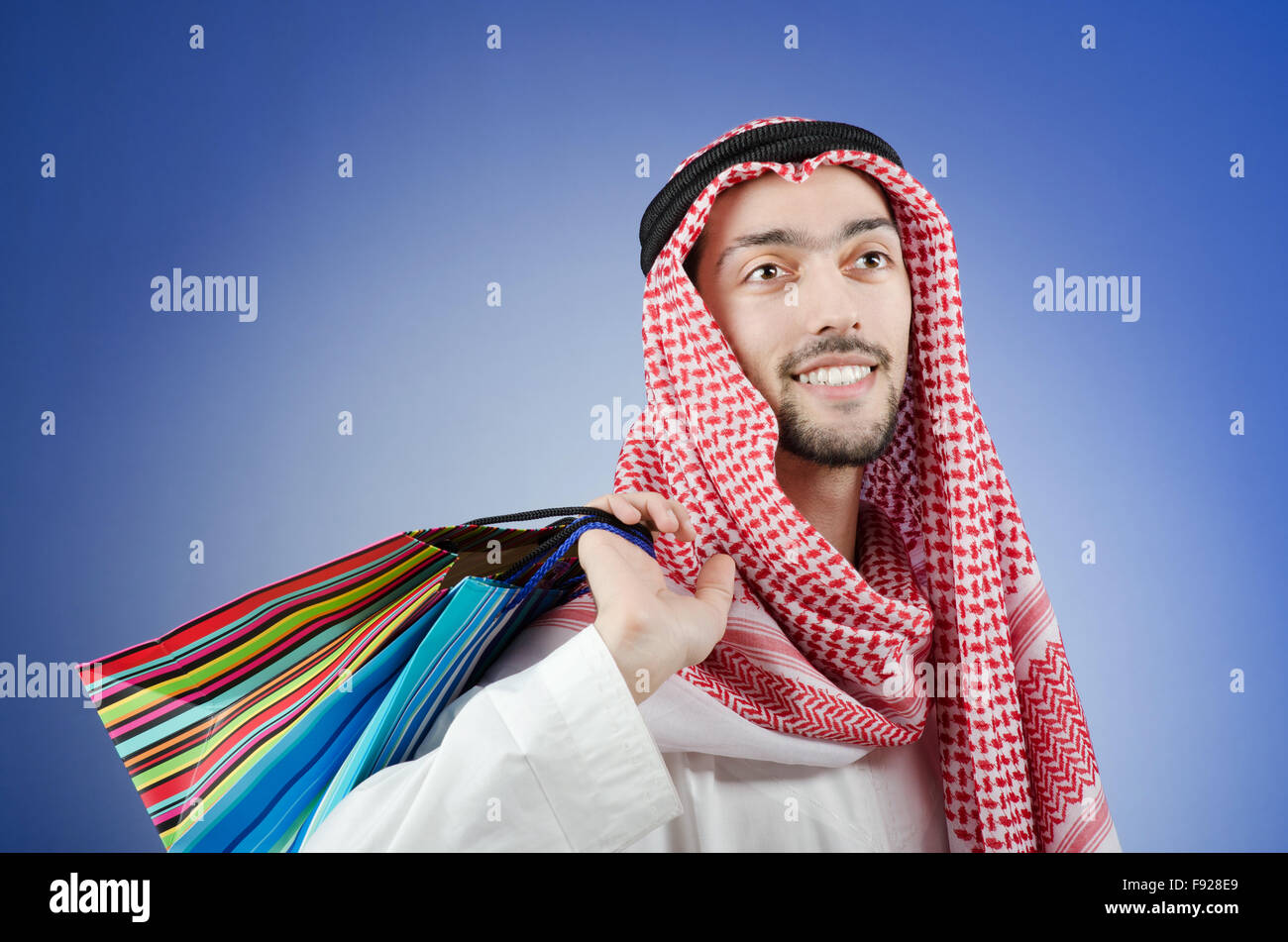 Arab with the gift bags Stock Photo - Alamy