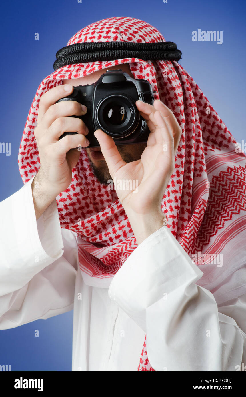 Arab photographer in studio shooting Stock Photo - Alamy
