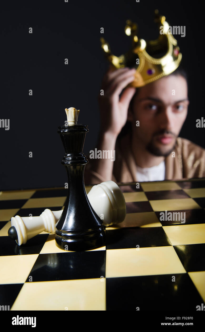Chess player playing his game Stock Photo - Alamy