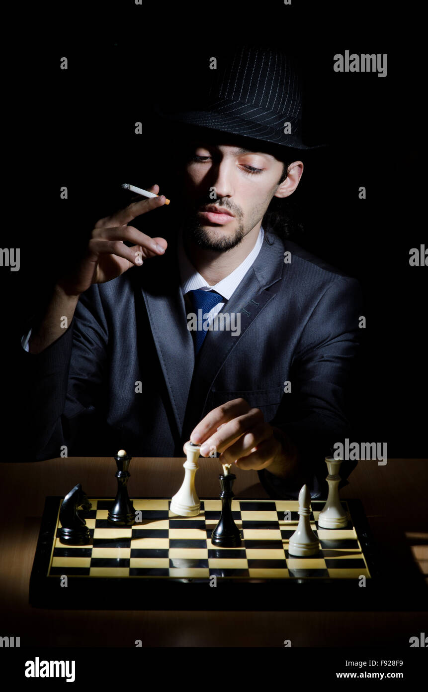 Chess player playing his game Stock Photo - Alamy