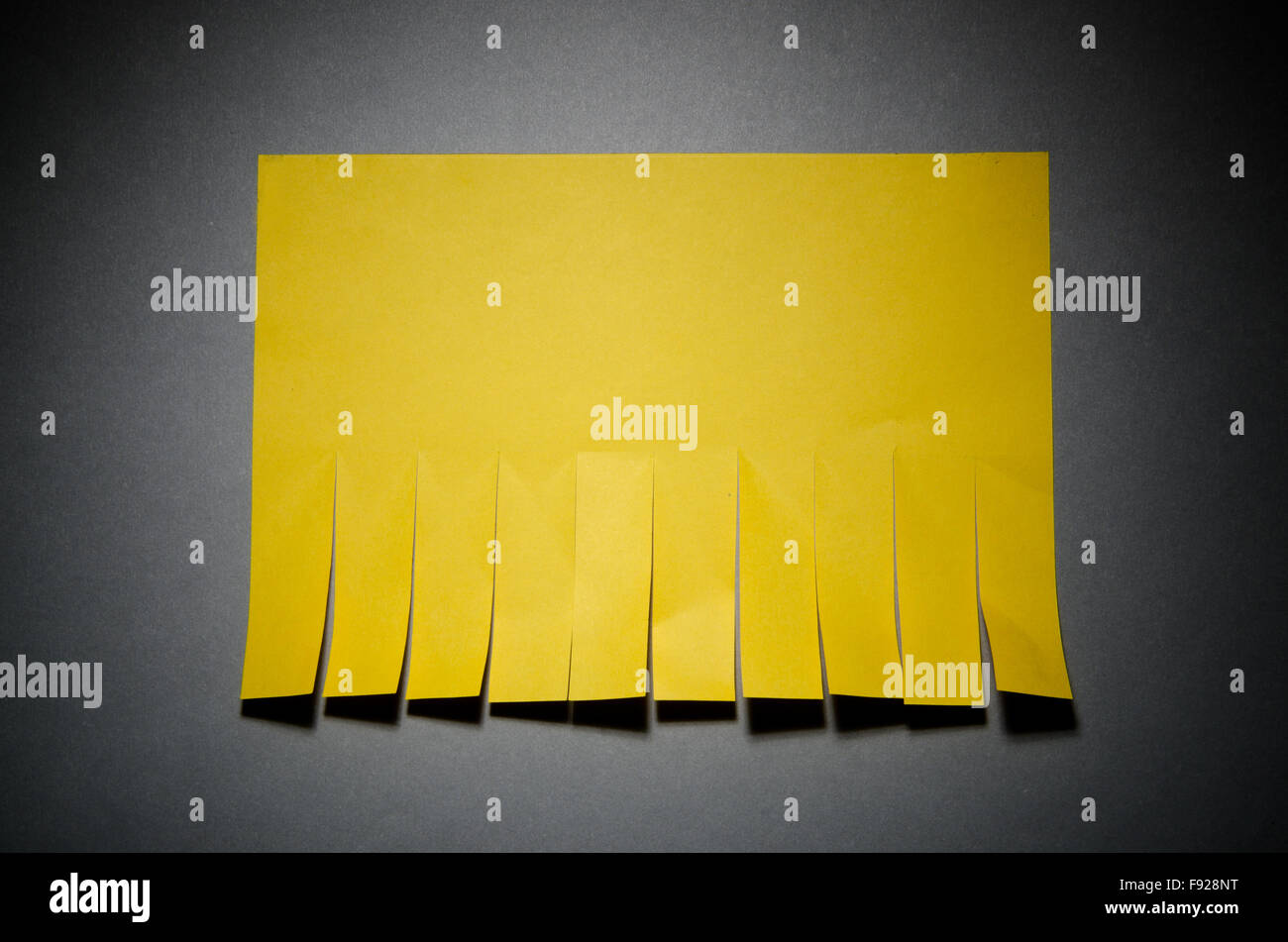 Tear off paper notice on the wall Stock Photo - Alamy