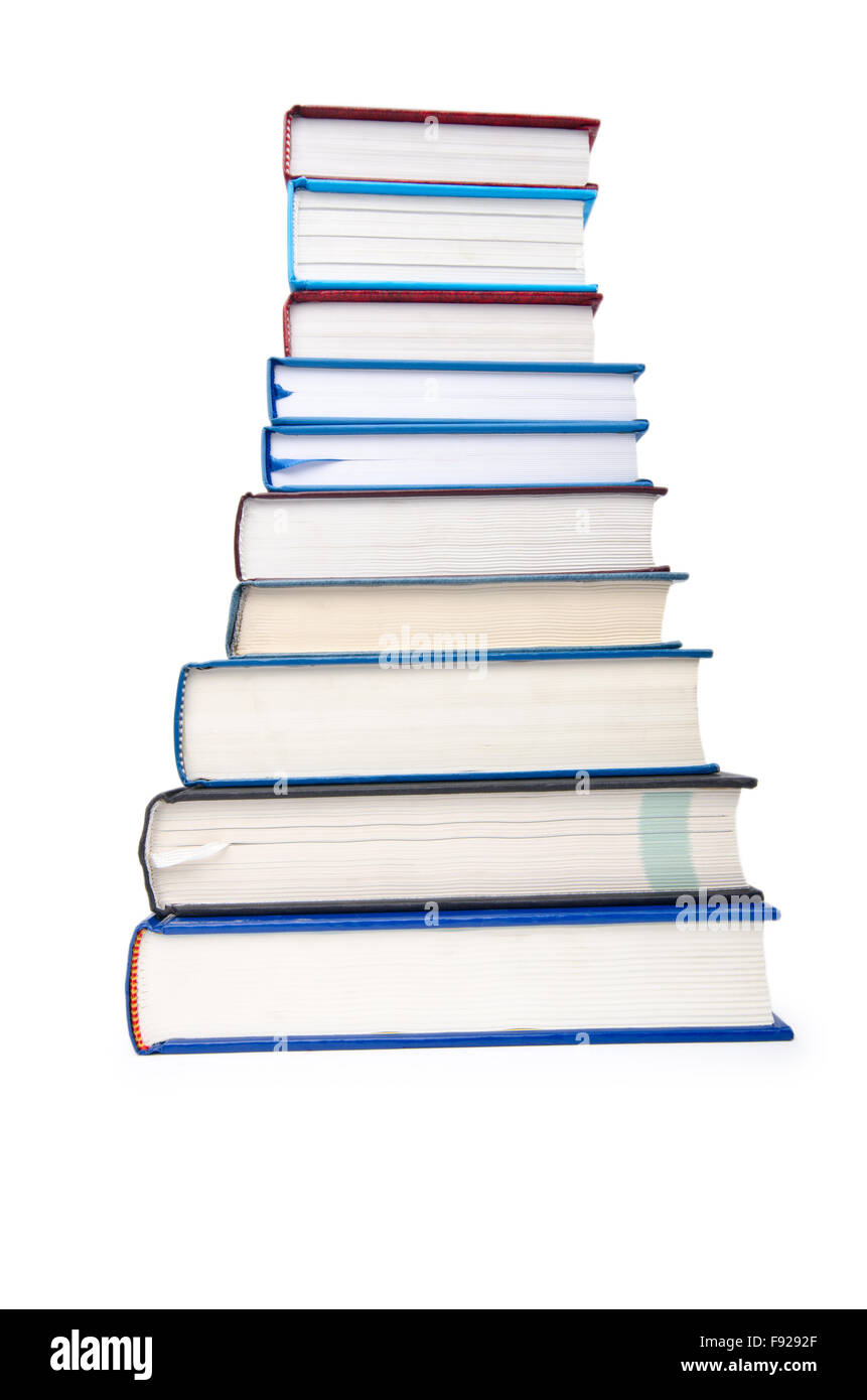 Books in high stack isolated on white Stock Photo - Alamy