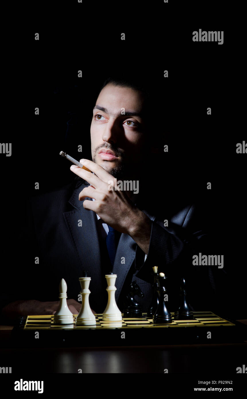 Chess player playing his game Stock Photo - Alamy