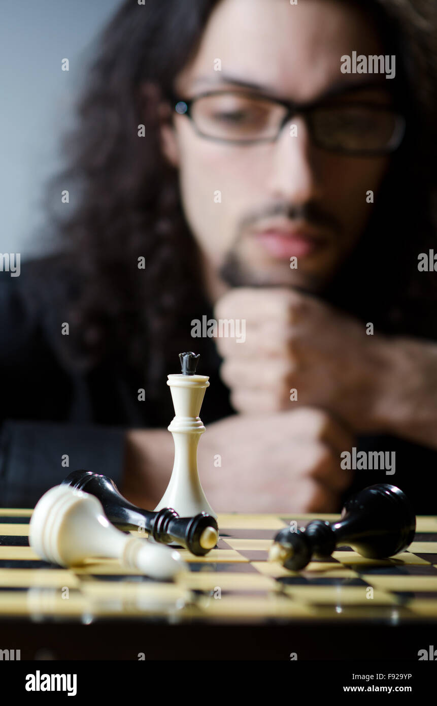 Chess player playing his game Stock Photo - Alamy