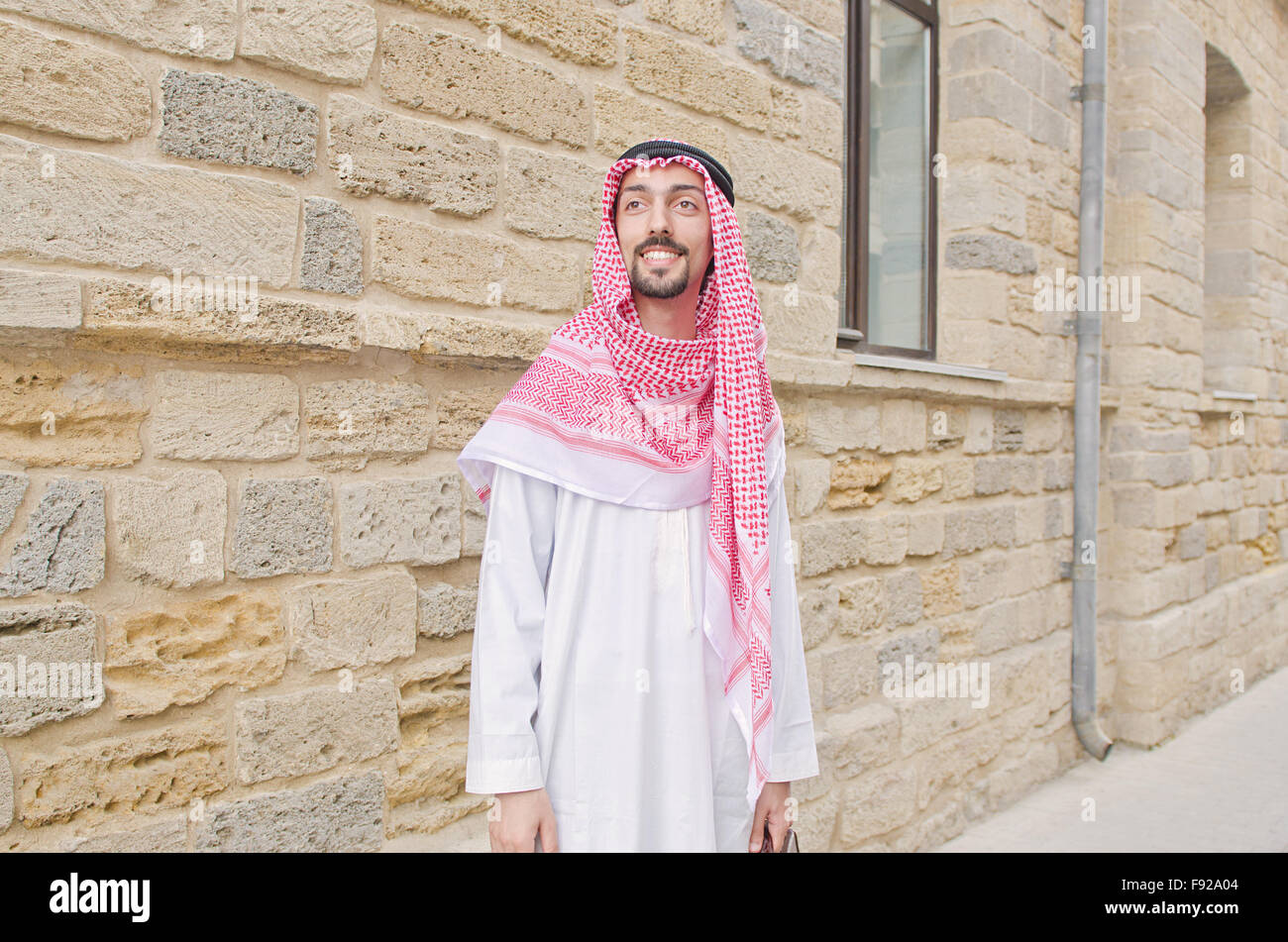 Arab on the street in summer Stock Photo - Alamy