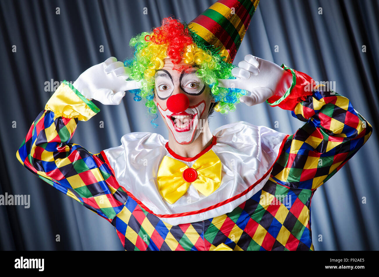 Funny clown in studio shooting Stock Photo - Alamy
