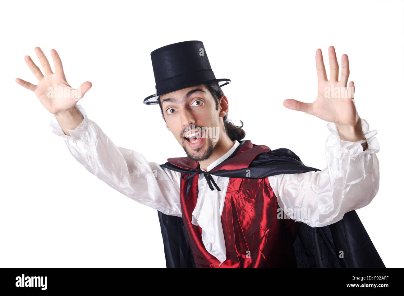 Magician isolated on the white background Stock Photo - Alamy