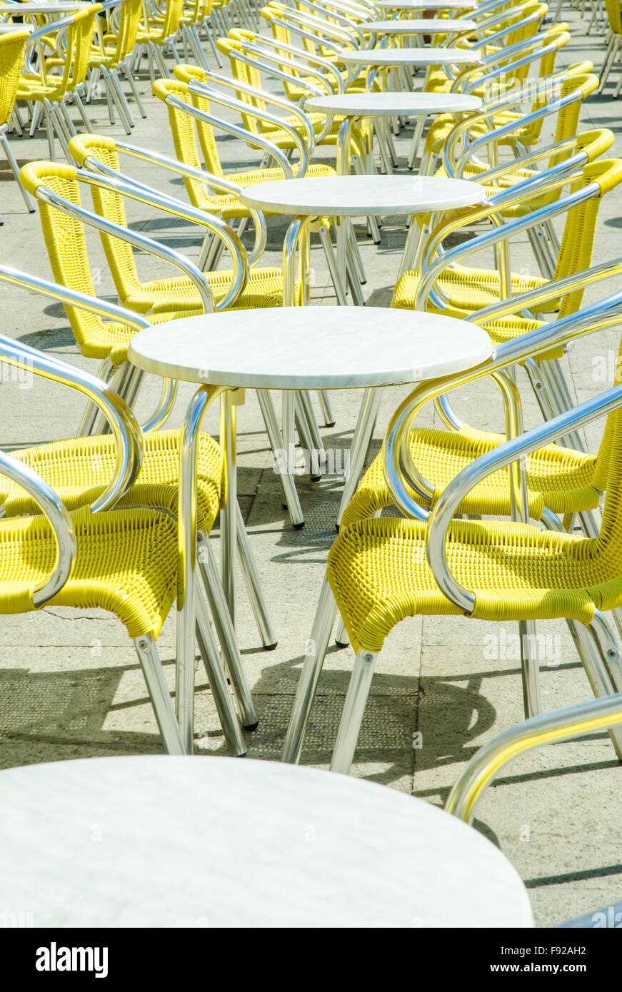 Empty tables of street cafe Stock Photo - Alamy