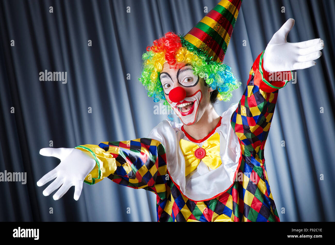 Funny clown in studio shooting Stock Photo - Alamy