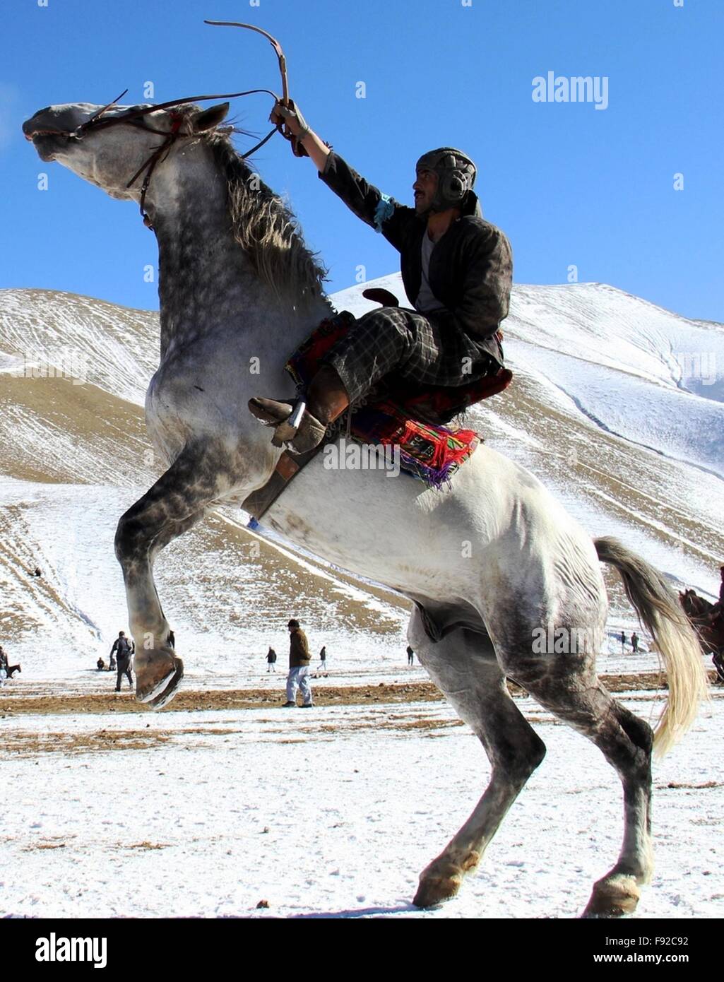 Bamyan, Afghanistan. 13th Dec, 2015. An Afghan horseman competes for ...