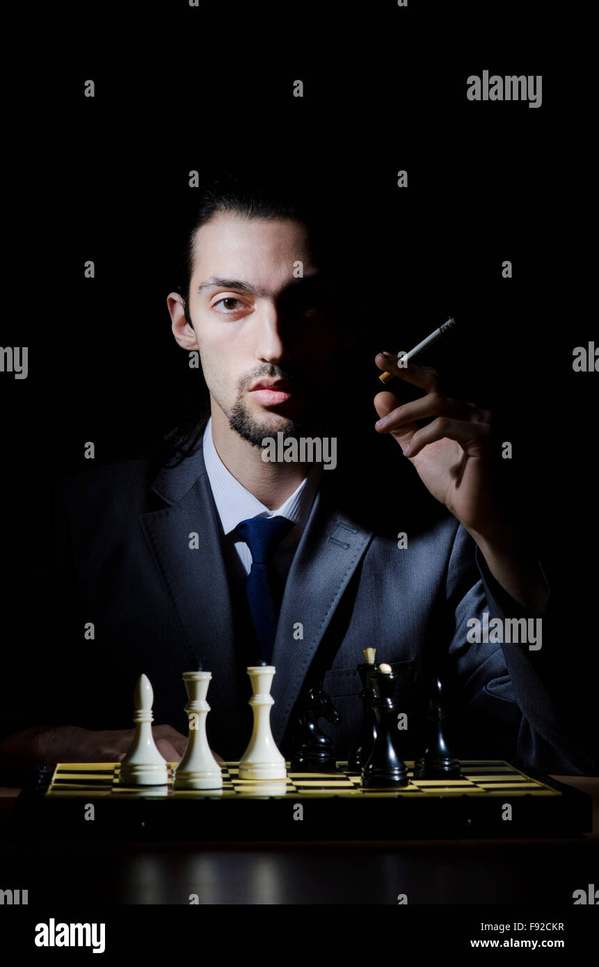 Chess player playing his game Stock Photo - Alamy