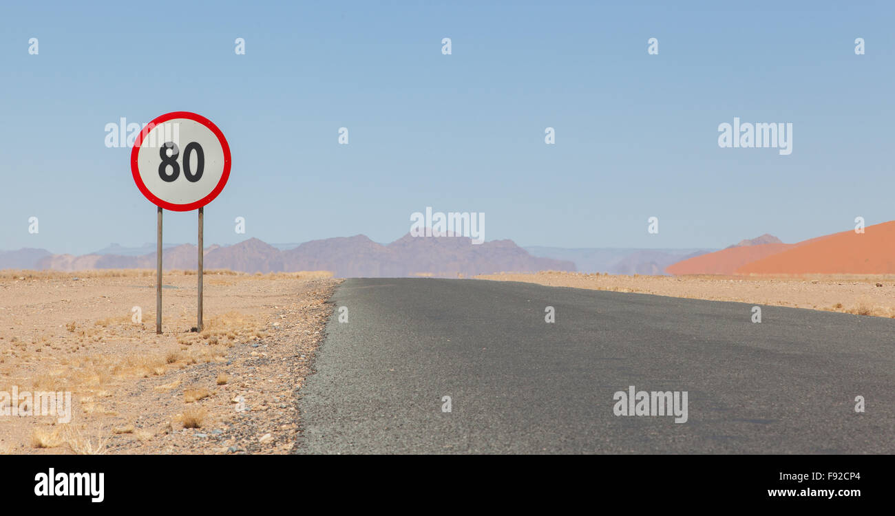 Speed limit sign at a desert road in Namibia, speed limit of 80 kph or ...