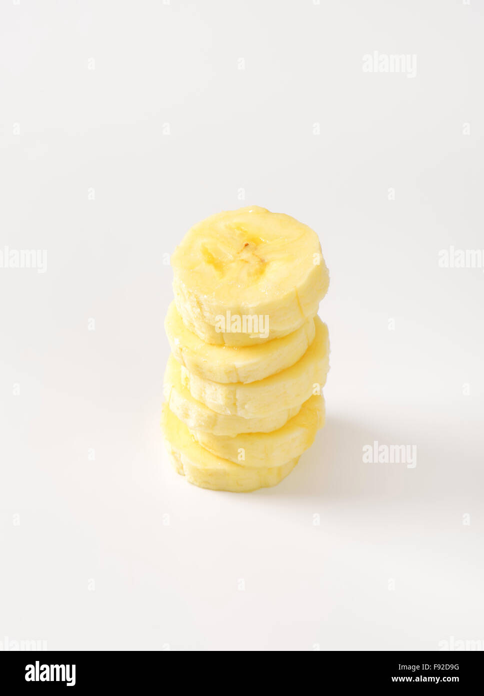 stack of banana slices on white background Stock Photo - Alamy