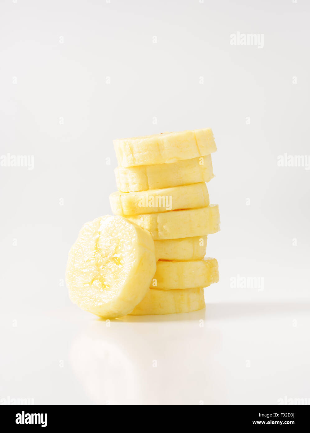 stack of banana slices on white background Stock Photo - Alamy