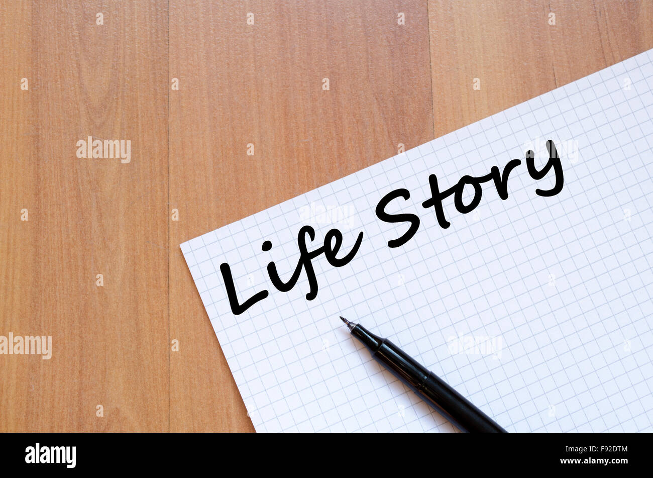 Life story text concept write on notebook with pen Stock Photo - Alamy