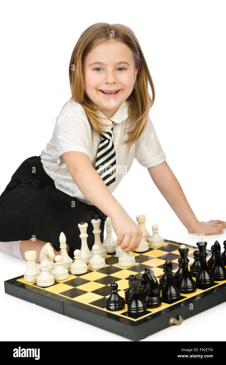 Cute girl playing chess on white Stock Photo - Alamy