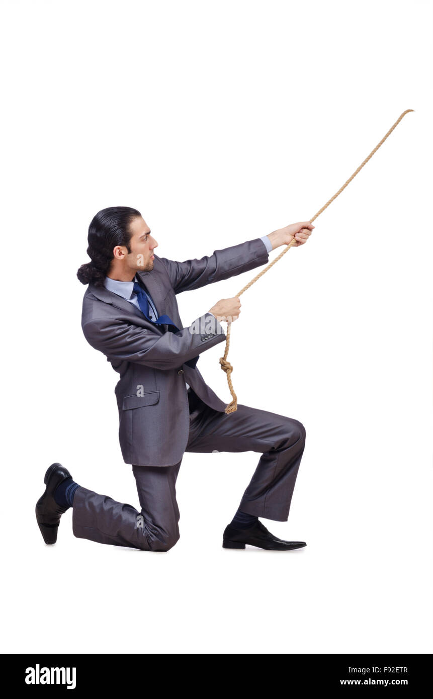 Businessman pulling rope on white Stock Photo - Alamy