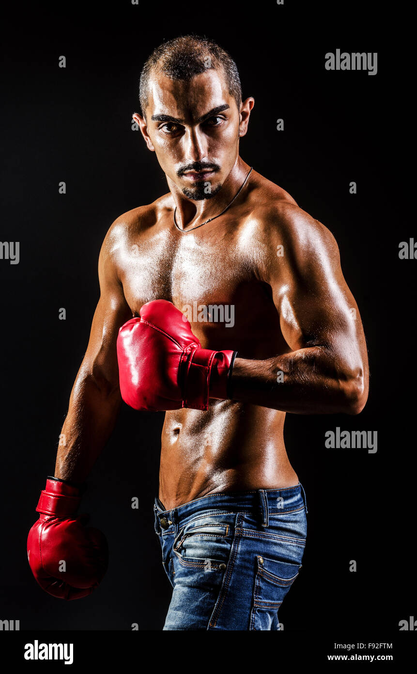 Young man with boxing gloves Stock Photo - Alamy