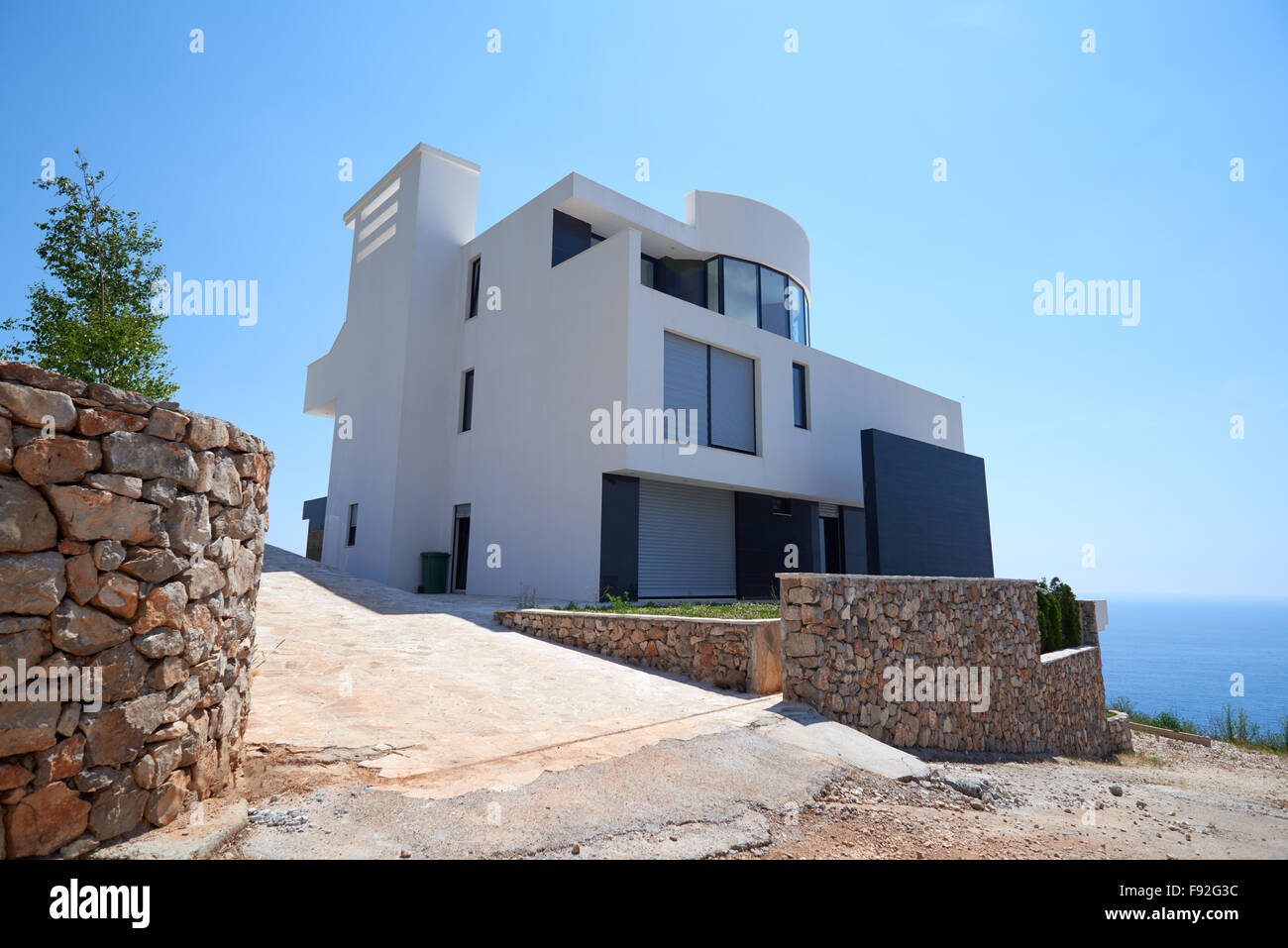 External view of a contemporary house modern villa at sunset Stock ...