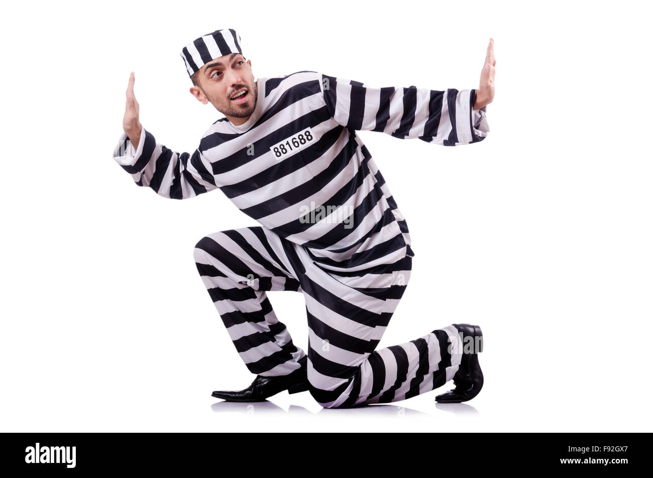 Convict criminal in striped uniform Stock Photo - Alamy
