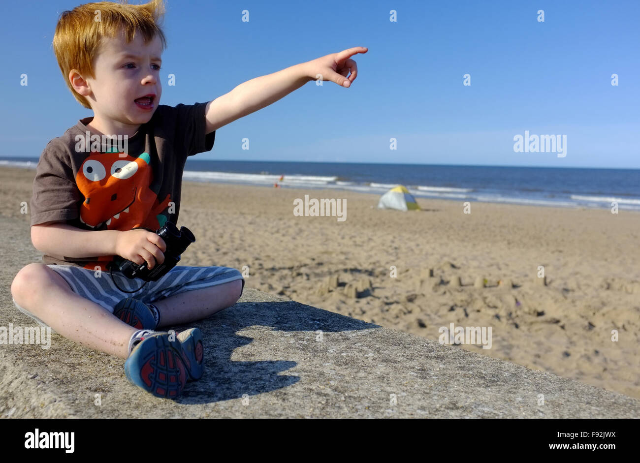 Boy point out hi-res stock photography and images - Alamy