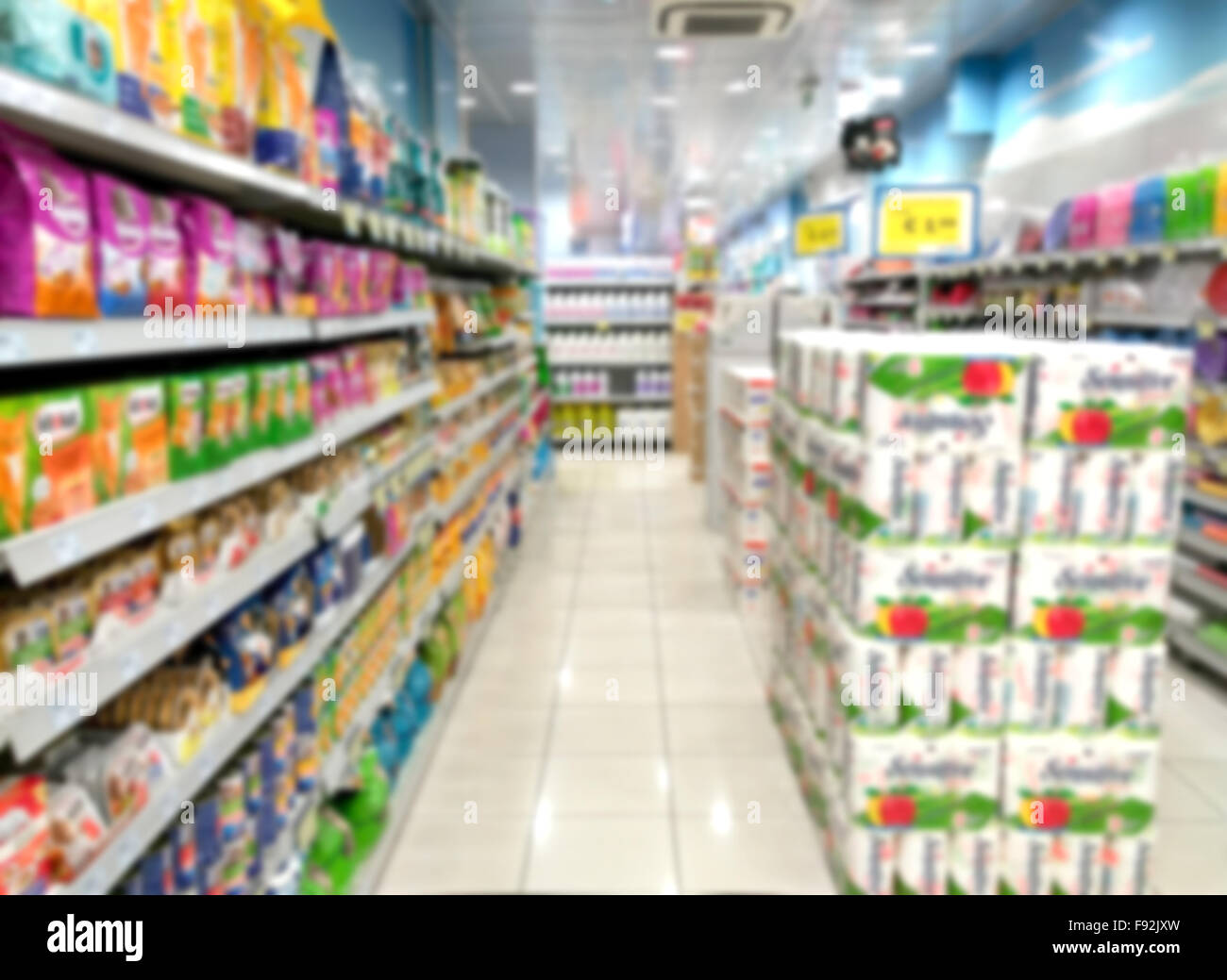 Blurry Supermarket Interior background Stock Photo - Alamy