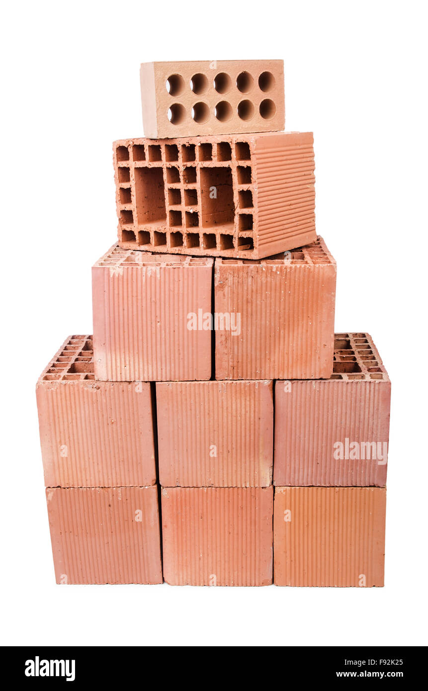 Stack of clay bricks isolated on white Stock Photo - Alamy