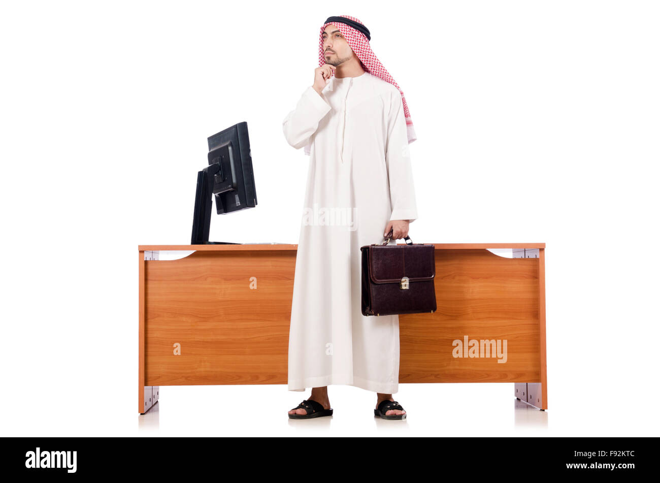 Arab man sitting at his desk Stock Photo - Alamy