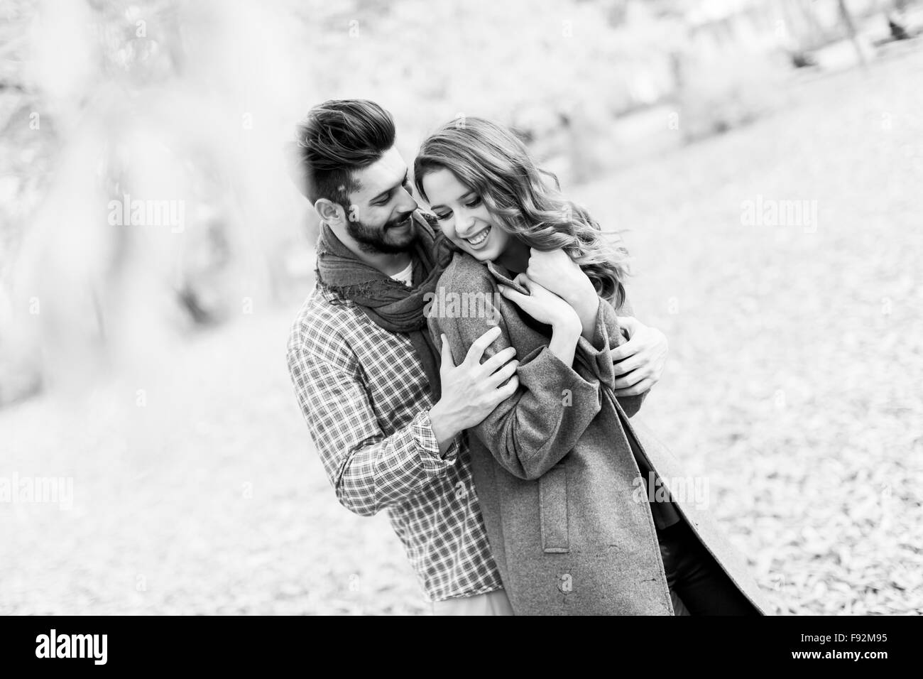 Happy couple standing in Black and White Stock Photos & Images - Alamy