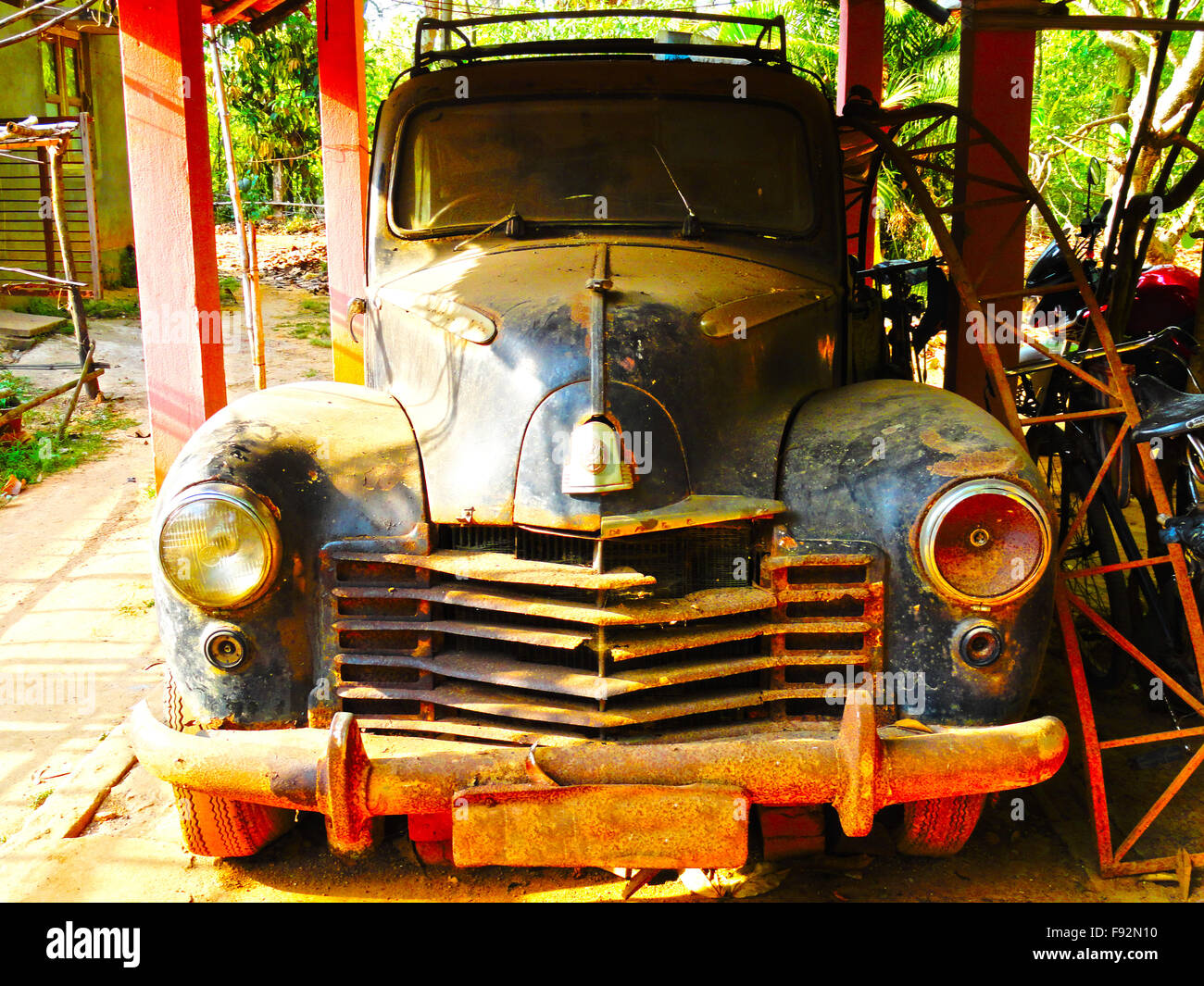 Old forgotten car at the backyard Stock Photo - Alamy