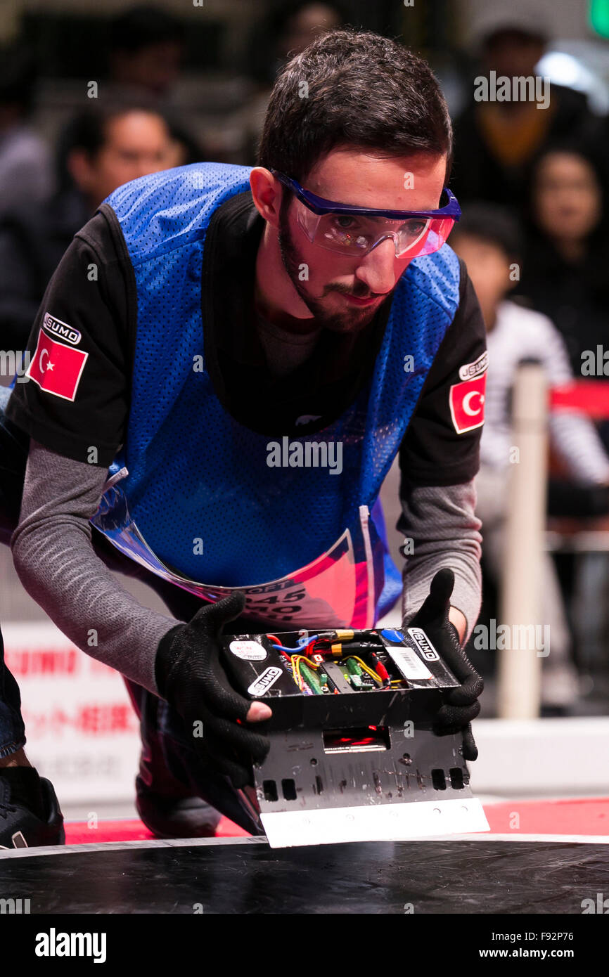 A robot operator from Turkey competes at the International Robot Sumo ...