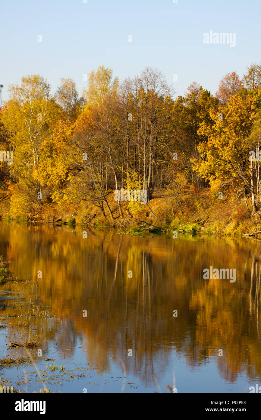 Colorful autumn trees fortress at the river front Stock Photo - Alamy