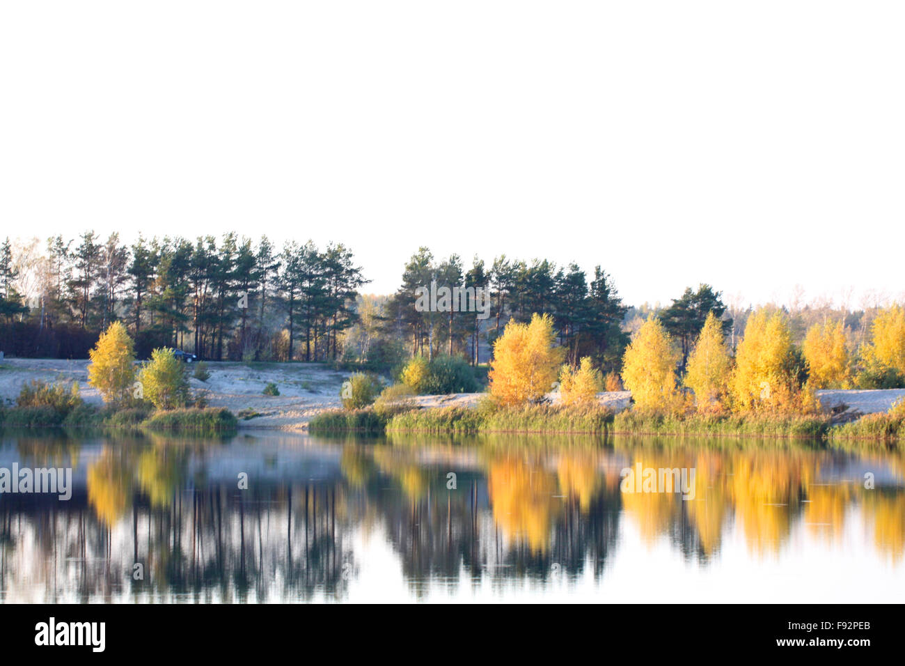 Colorful autumn trees fortress at the river front Stock Photo - Alamy