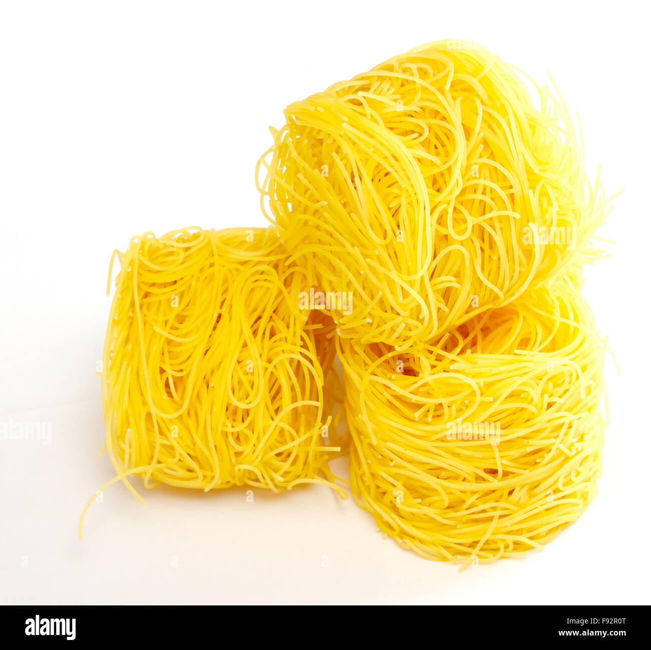 dried italian pasta (macaroni) isolated on white background Stock Photo ...