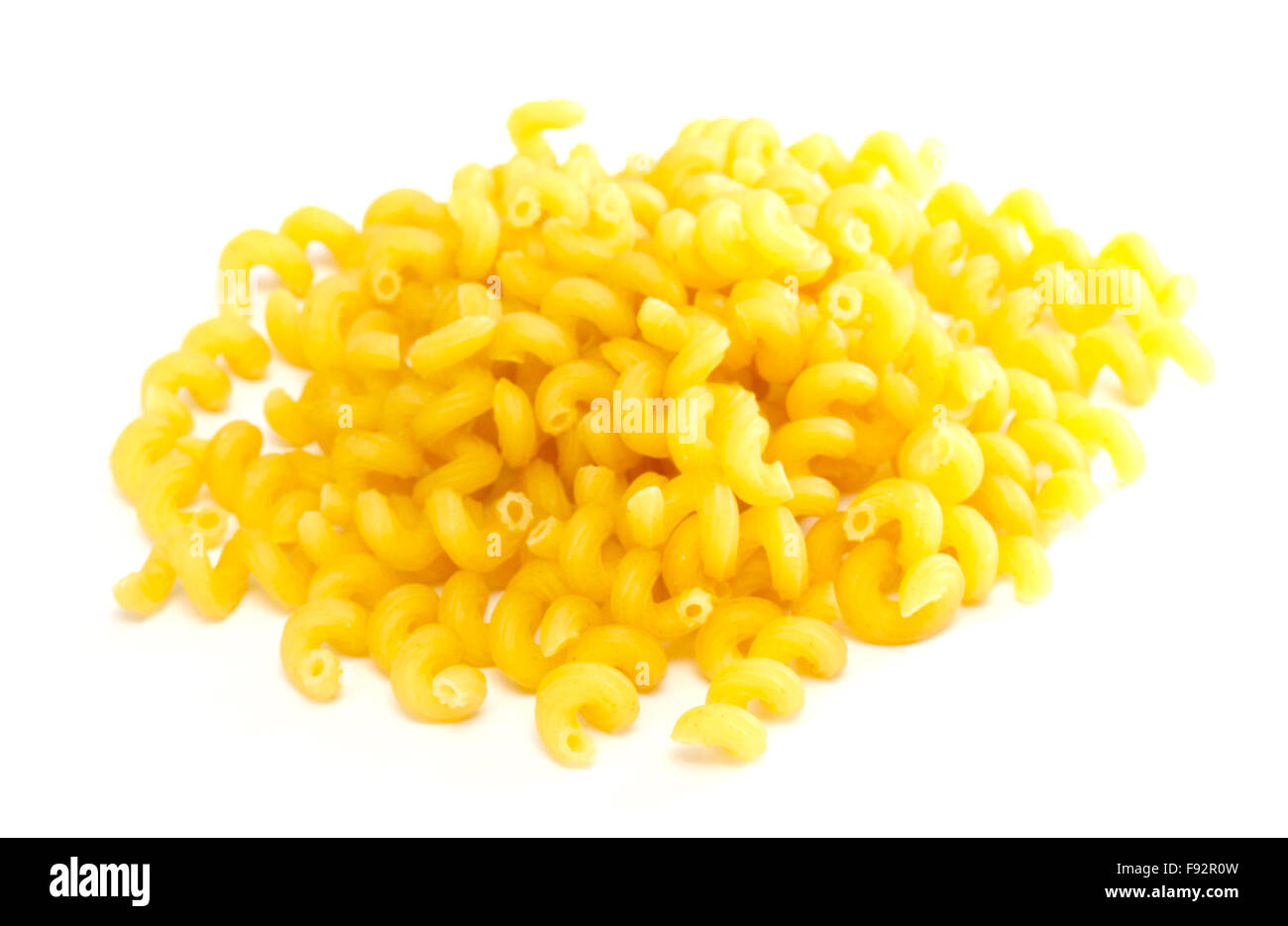 dried italian pasta (macaroni) isolated on white background Stock Photo ...
