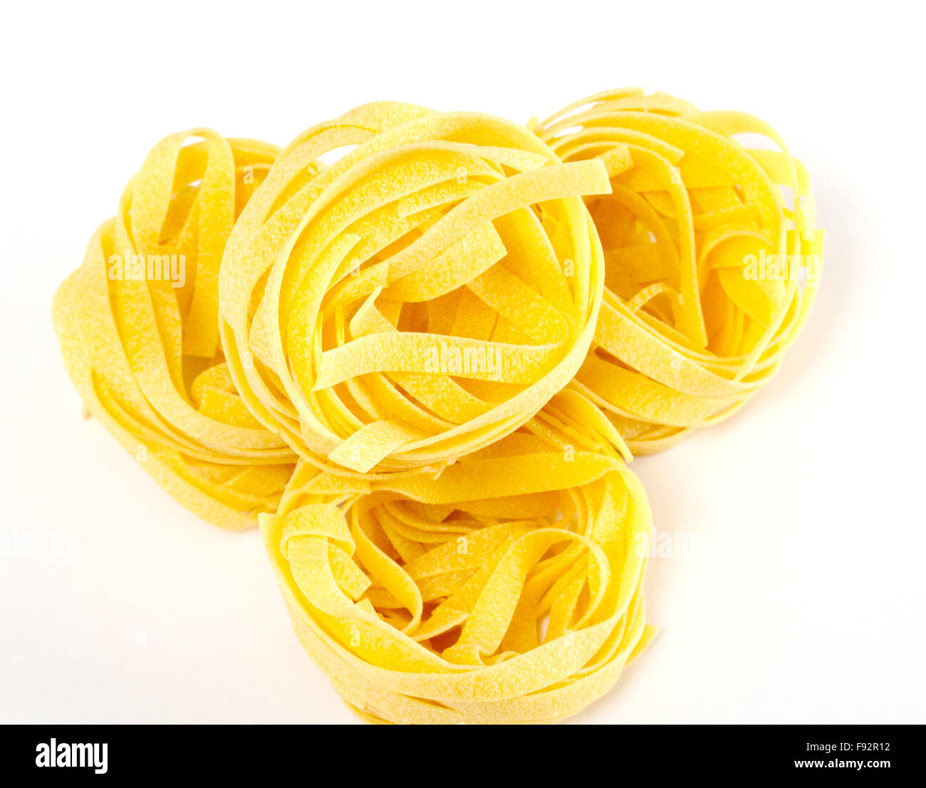 dried italian pasta (macaroni) isolated on white background Stock Photo ...
