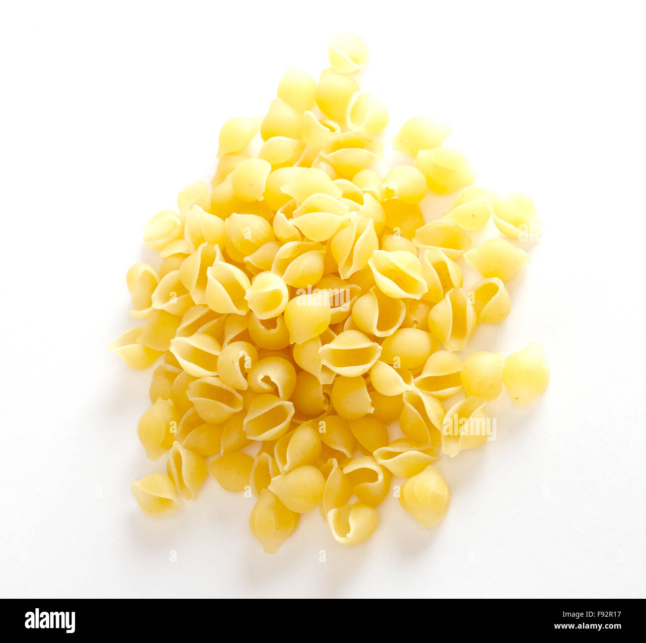 dried italian pasta (macaroni) isolated on white background Stock Photo ...
