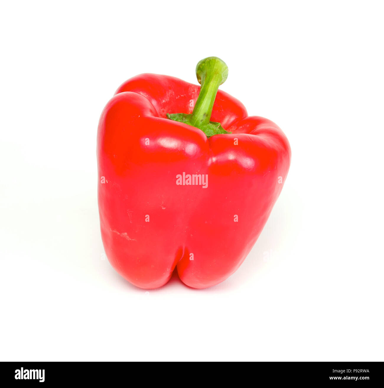 Bright red pepper isolated on white Stock Photo - Alamy
