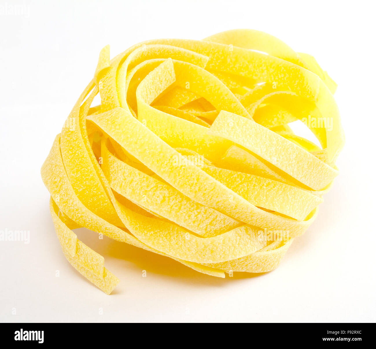 dried italian pasta (macaroni) isolated on white background Stock Photo ...