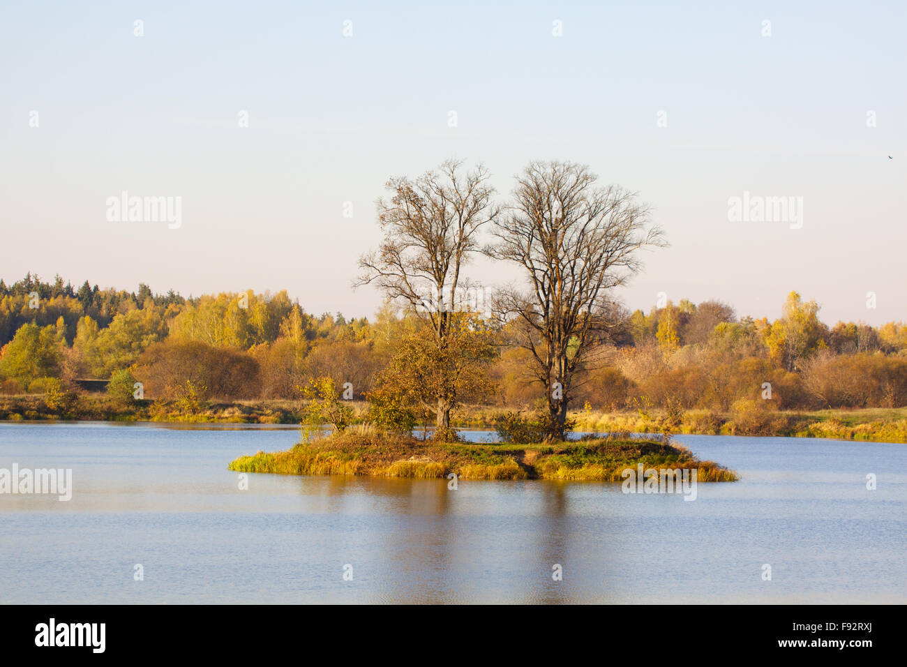 Colorful autumn trees fortress at the river front Stock Photo - Alamy